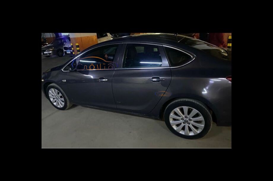 Astra Opel 2013 6 October Dark grey 6930994 - Car for sale : Hatla2ee