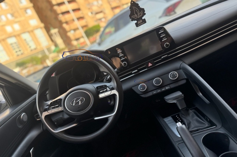 Elantra CN7 Hyundai 2021 Cairo White 6931231 - Car for sale : Hatla2ee