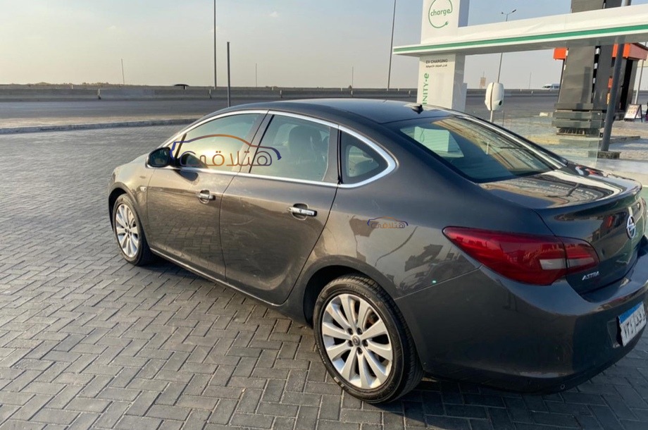 Astra Opel 2013 6 October Gray 6935541 - Car for sale : Hatla2ee