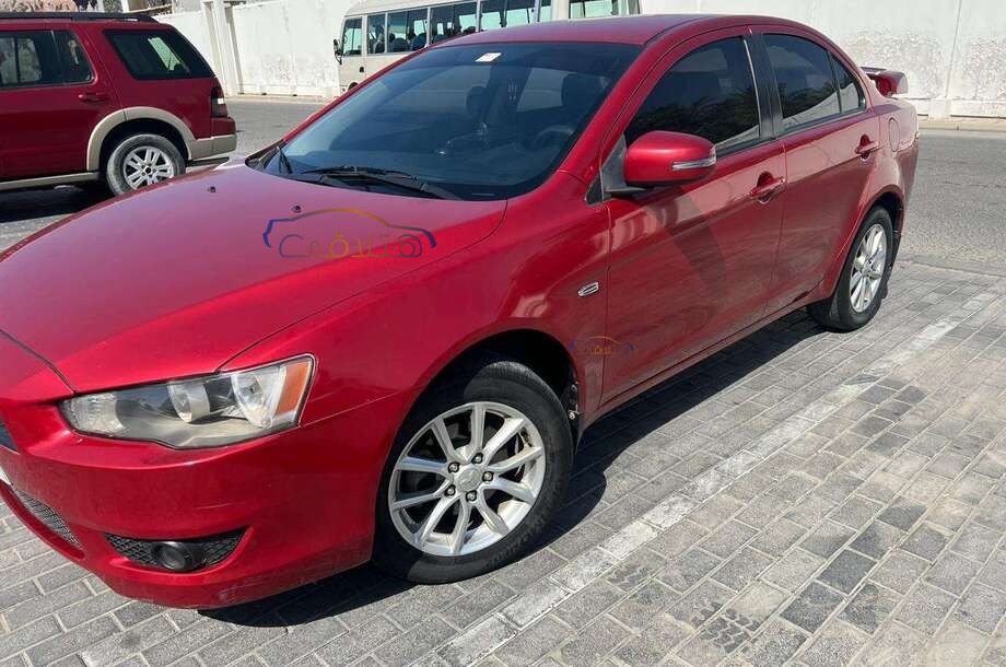 Lancer EX Shark Mitsubishi 2015 Qena Red 6938305 - Car for sale : Hatla2ee