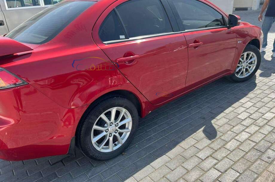 Lancer EX Shark Mitsubishi 2015 Qena Red 6938305 - Car for sale : Hatla2ee