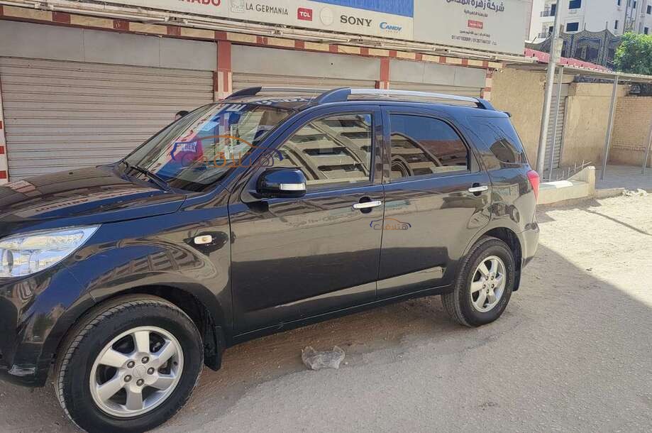 Grand terios Daihatsu 2010 Mokattam Black 6942071 - Car for sale : Hatla2ee