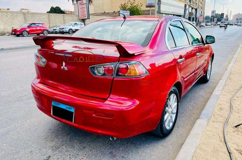 Lancer EX Shark Mitsubishi 2015 Maadi Red 6943008 - Car for sale : Hatla2ee