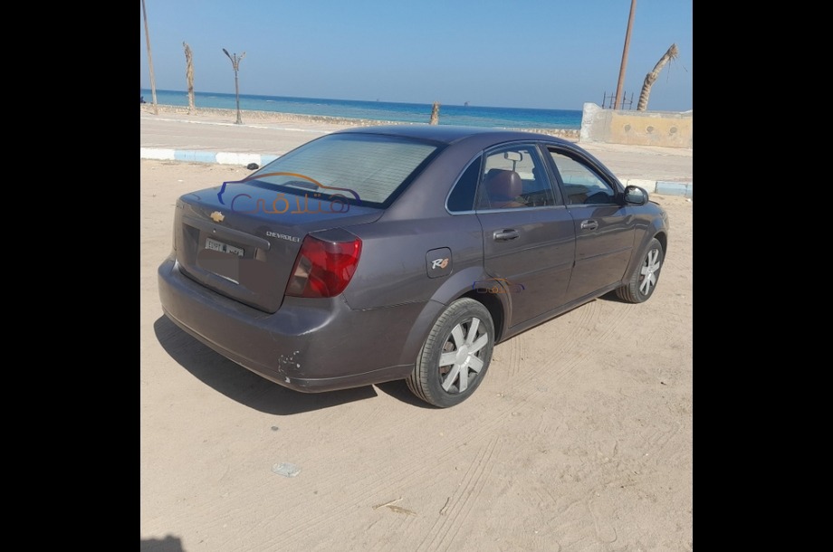 Optra Chevrolet 2011 Red Sea Dark grey 6943593 - Car for sale : Hatla2ee