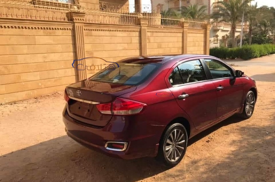 Belta Toyota 2022 Maadi Dark red 6944502 - Car for sale : Hatla2ee