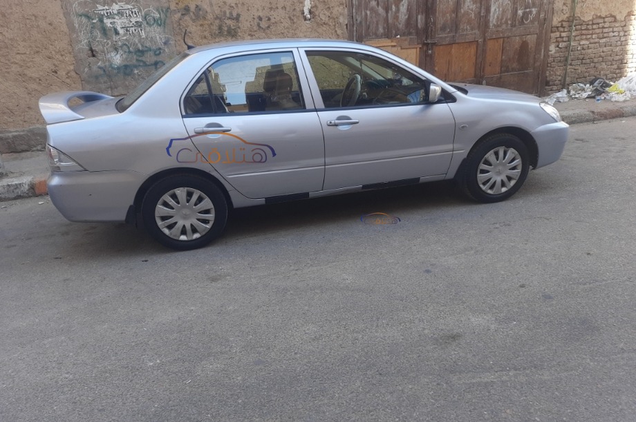 Lancer Puma Mitsubishi 2014 Qena Silver 6950539 - Car for sale : Hatla2ee