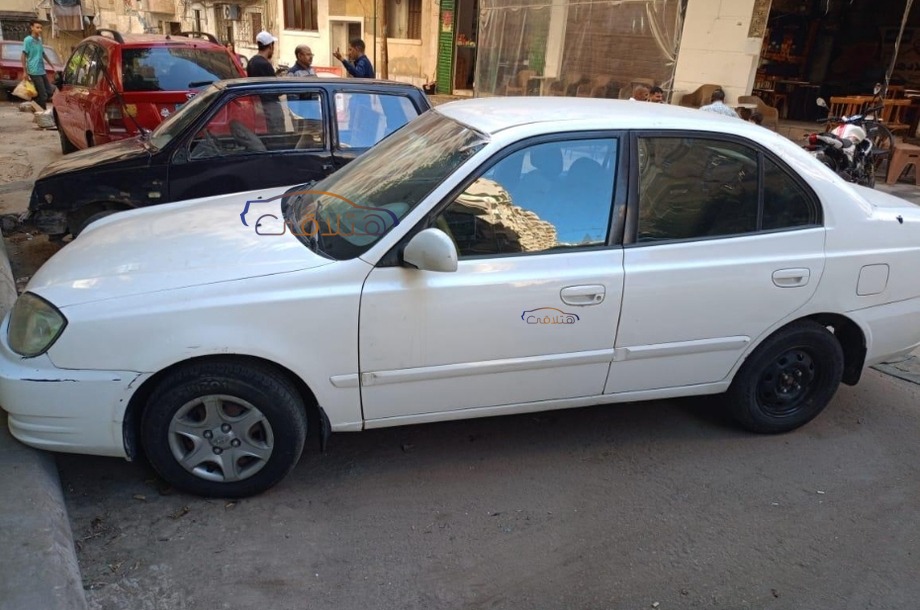 Verna Hyundai 2004 Giza White 6952240 - Car for sale : Hatla2ee
