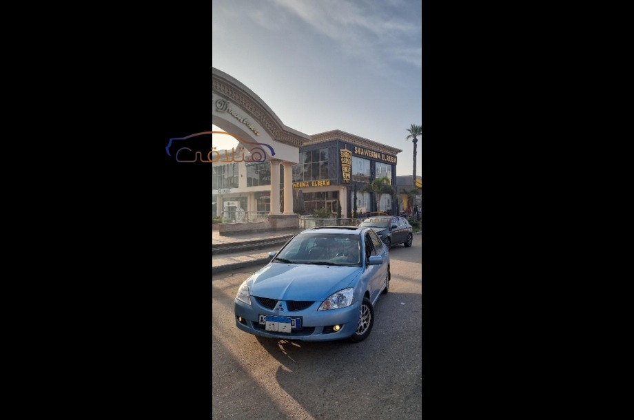 Lancer Puma Mitsubishi 2004 Tanta Cyan 6953047 - Car for sale : Hatla2ee