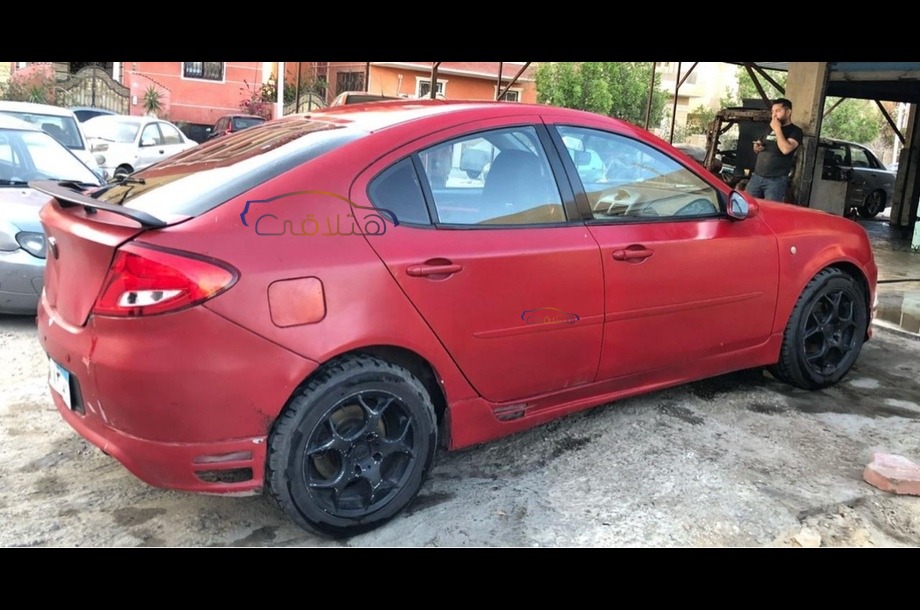 Gen 2 Proton 2013 6 October Red 6953910 - Car for sale : Hatla2ee