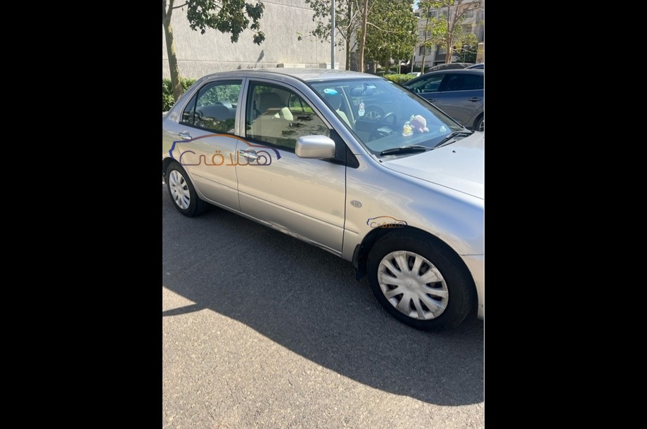 لانسر بومة ميتسوبيشي مدينتى فضي 6954943 - سيارات مستعملة للبيع : هتلاقى