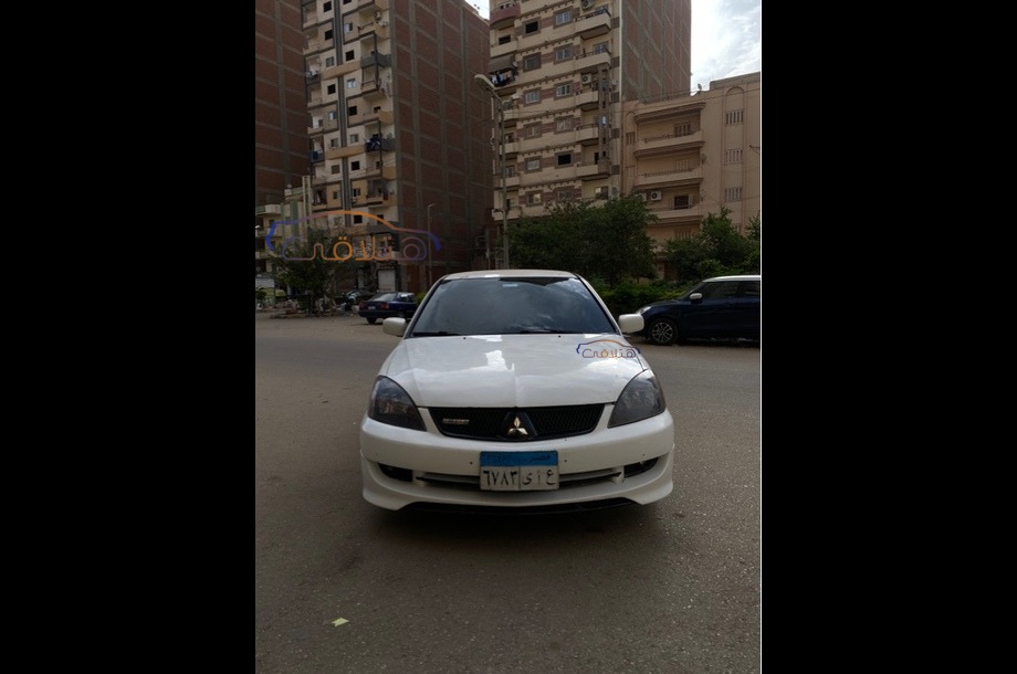 Lancer Puma Mitsubishi 2012 Gharbia White 6955627 - Car for sale : Hatla2ee