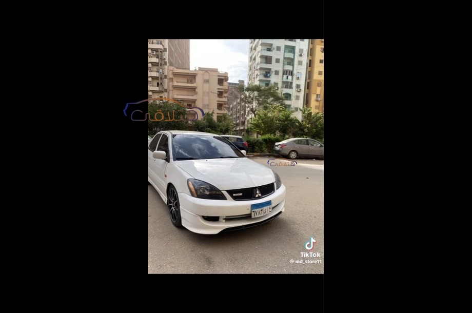 Lancer Puma Mitsubishi 2012 Gharbia White 6955627 - Car for sale : Hatla2ee