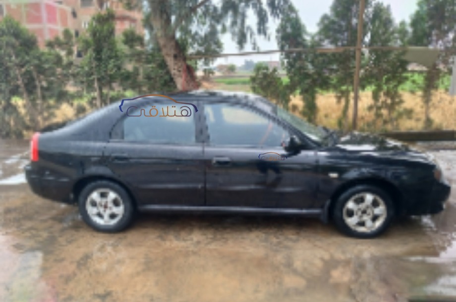 Spectra Kia 2001 Cairo Black 6956554 - Car for sale : Hatla2ee