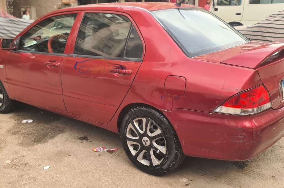 Lancer Puma Mitsubishi 2007 Sheraton Red 6957550 - Car for sale : Hatla2ee