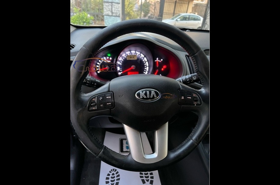 Sportage Kia 2013 Sheikh Zayed City Bronze 6958470 - Car for sale : Hatla2ee