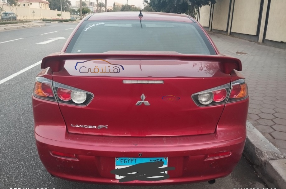 Lancer Mitsubishi 2015 Mohandessin Red 6959477 - Car for sale : Hatla2ee
