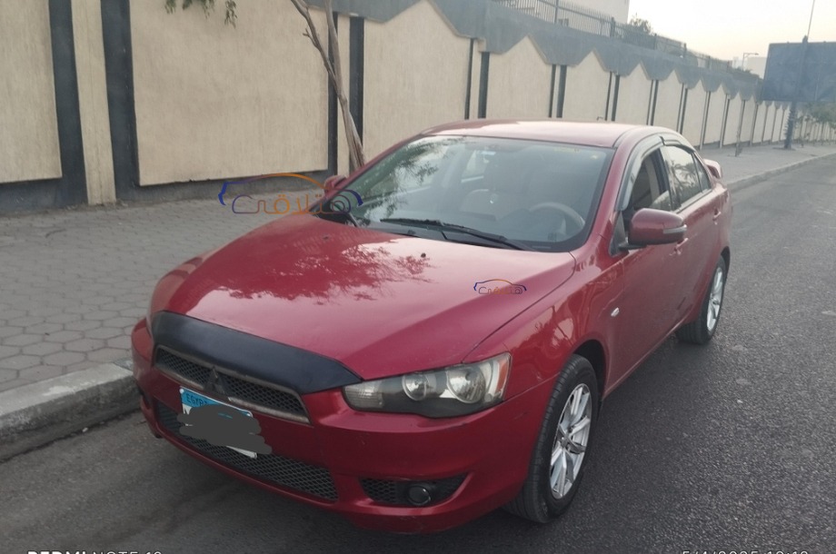 Lancer Mitsubishi 2015 Mohandessin Red 6959477 - Car for sale : Hatla2ee