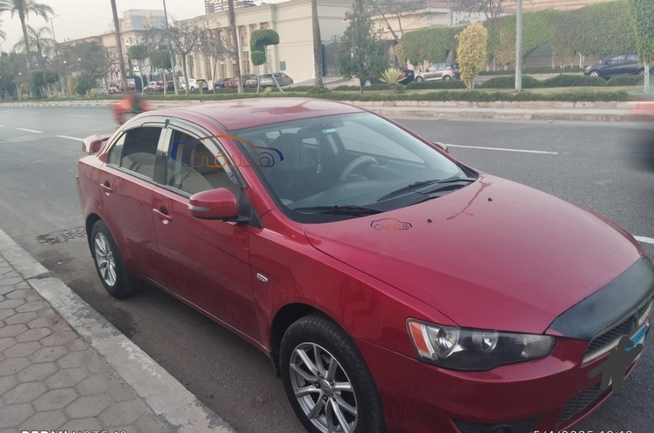Lancer Mitsubishi 2015 Mohandessin Red 6959477 - Car for sale : Hatla2ee
