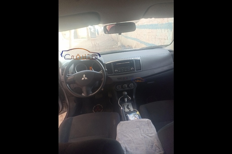 Lancer Mitsubishi 2014 Giza Silver 6961218 - Car for sale : Hatla2ee