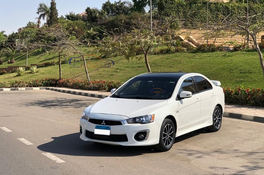 Lancer Mitsubishi 2015 Cairo White 6965767 - Car for sale : Hatla2ee