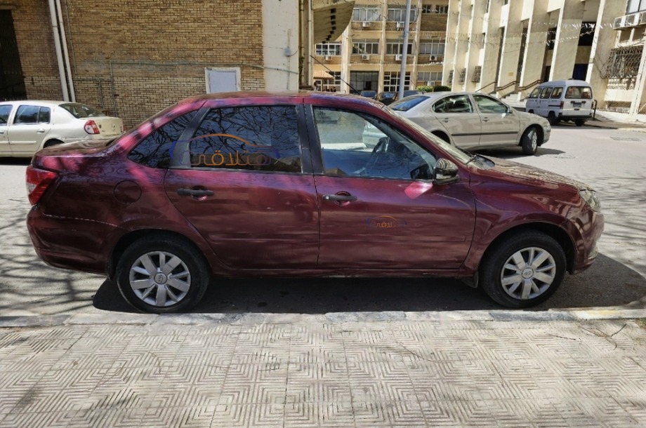 Granta Lada 2021 Alexandria Dark red 6966757 - Car for sale : Hatla2ee
