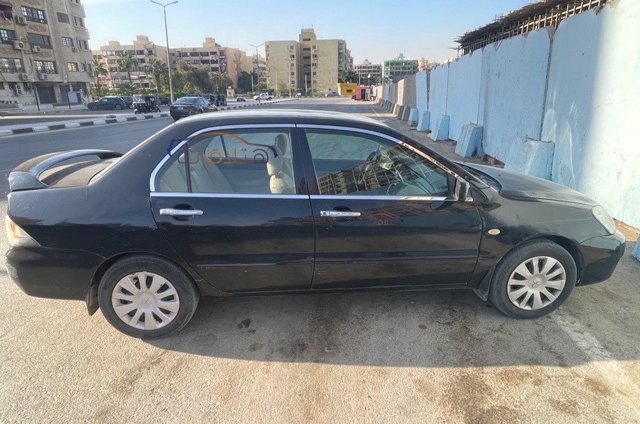 Lancer Puma Mitsubishi 2009 Nasr city Black 6968462 - Car for sale ...