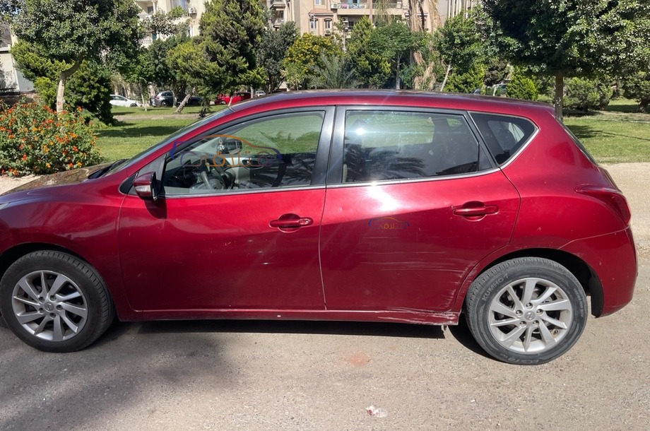 Tiida Nissan 2014 Tagamo3 - New Cairo Red 6968724 - Car for sale : Hatla2ee
