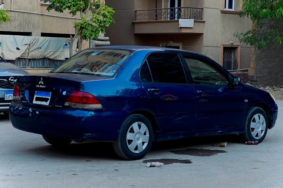 Lancer Puma Mitsubishi 2006 Mokattam Blue 6970558 - Car for sale : Hatla2ee