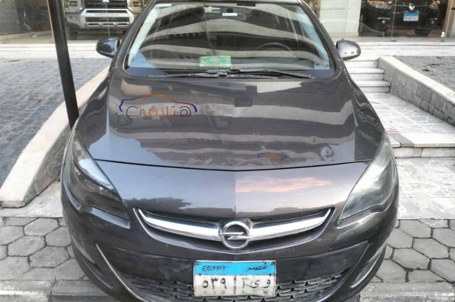 Astra Opel 2015 Nasr city Gray 6970898 - Car for sale : Hatla2ee