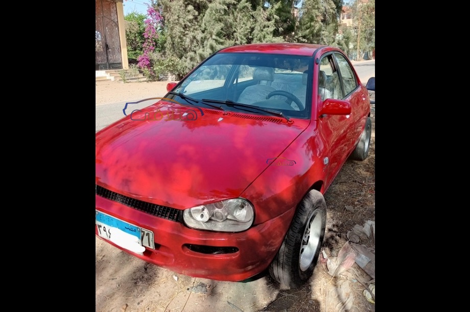 121 Mazda 1997 Kafr el-Sheikh Red 6971621 - Car for sale : Hatla2ee