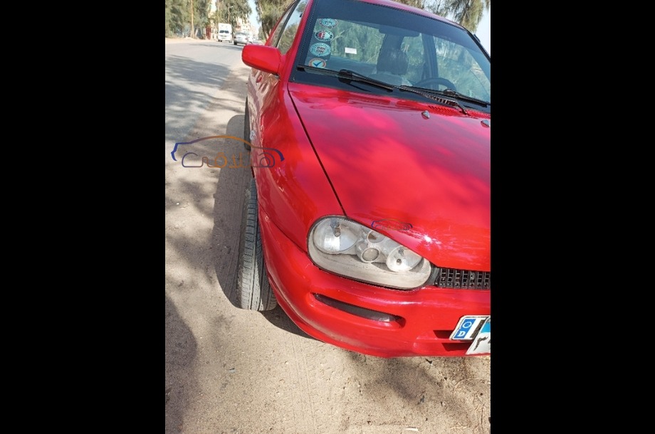121 Mazda 1997 Kafr el-Sheikh Red 6971621 - Car for sale : Hatla2ee
