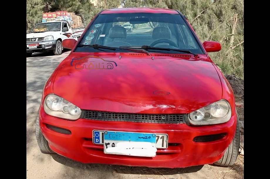 121 Mazda 1997 Kafr el-Sheikh Red 6971621 - Car for sale : Hatla2ee