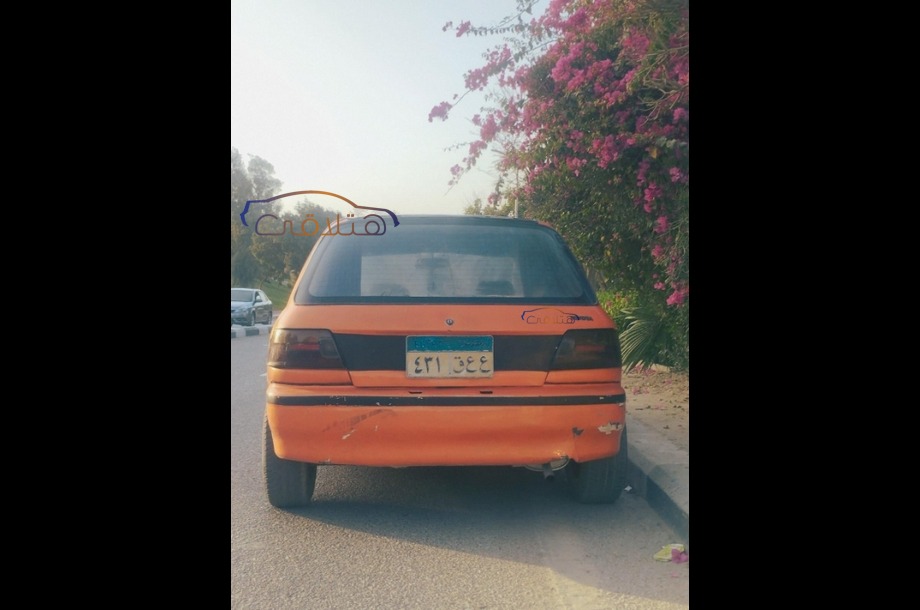 Starlet Toyota 1991 Helwan Orange 6978184 - Car for sale : Hatla2ee
