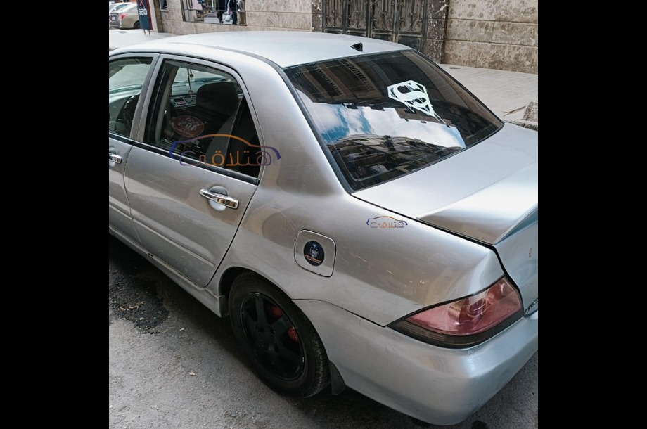 Lancer Puma Mitsubishi 2008 Suez Silver 6978260 - Car for sale : Hatla2ee