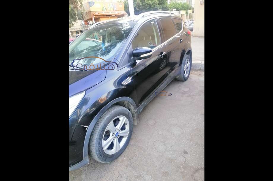 Kuga Ford 2015 Pyramids Gardens Black 6979494 - Car for sale : Hatla2ee