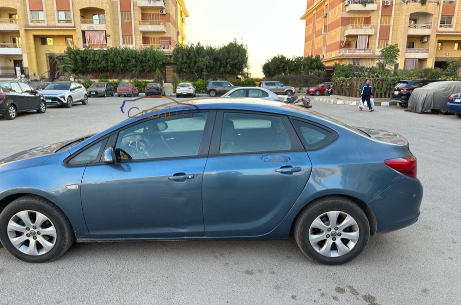 Astra Opel 2015 Al Shorouk Blue 6981730 - Car for sale : Hatla2ee