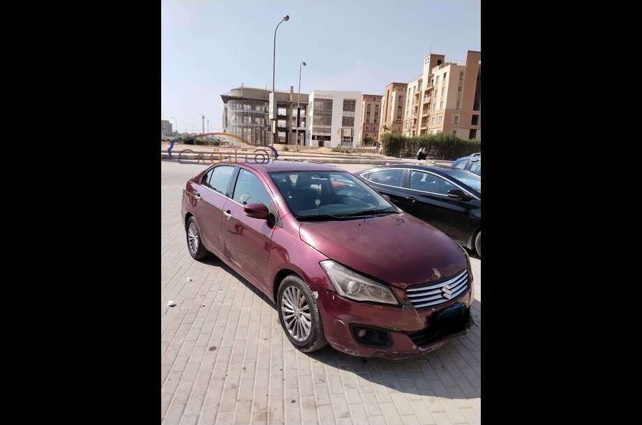 Ciaz Suzuki 2015 6 October Dark red 6984184 - Car for sale : Hatla2ee