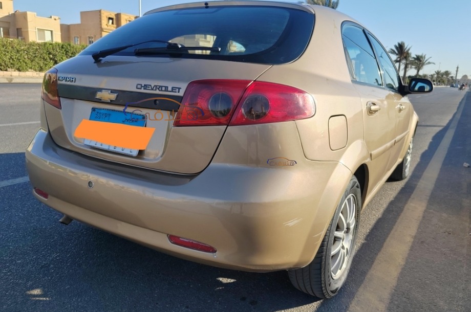 Optra Chevrolet 2006 6 October Gold 6984611 - Car for sale : Hatla2ee
