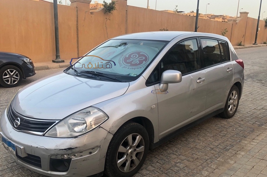Tiida Nissan 2011 6 October Silver 6984987 - Car for sale : Hatla2ee