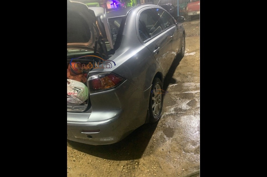 Lancer Mitsubishi 2015 Imbaba Silver 6989216 - Car for sale : Hatla2ee
