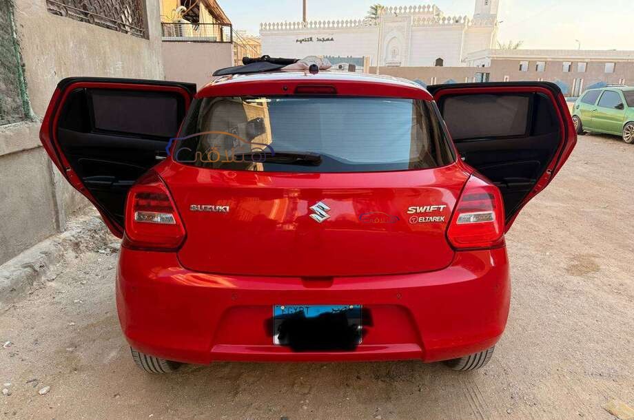 Swift Suzuki 2021 Suez Red 6989983 - Car for sale : Hatla2ee