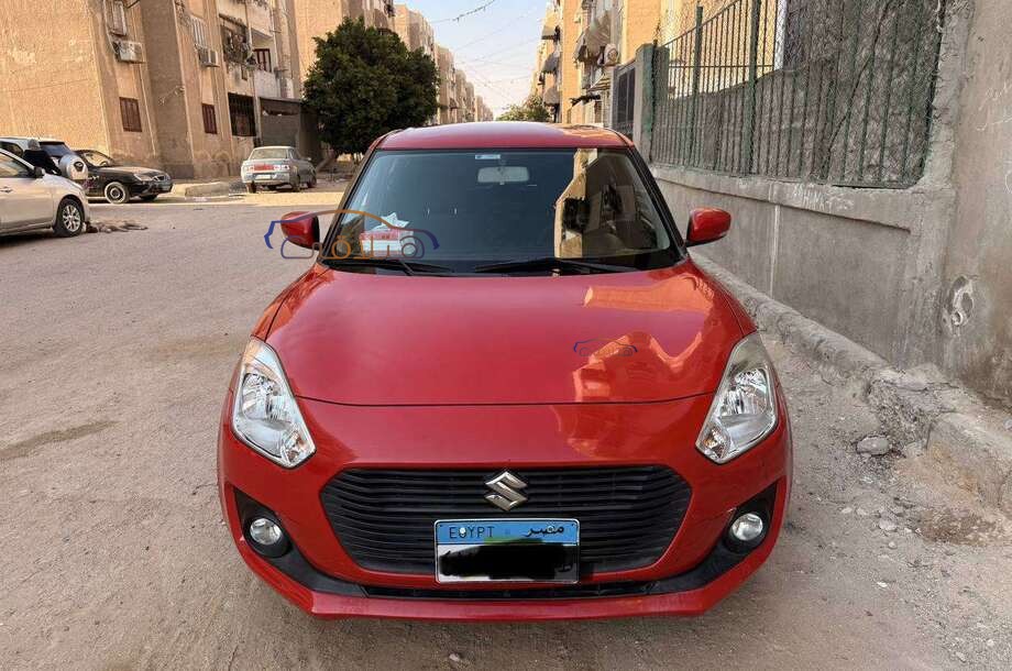 Swift Suzuki 2021 Suez Red 6989983 - Car for sale : Hatla2ee