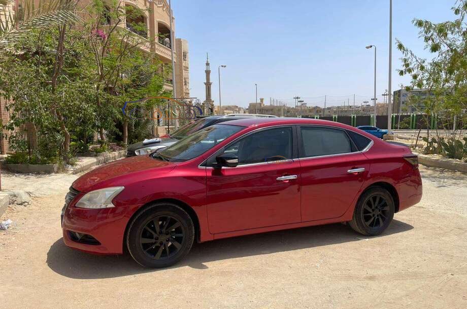 Sentra Nissan 2017 Cairo Red 6990309 - Car for sale : Hatla2ee