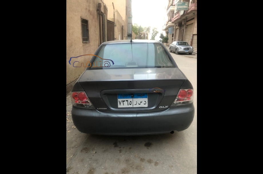Lancer Puma Mitsubishi 2009 Mansoura Gray 6991858 - Car for sale : Hatla2ee