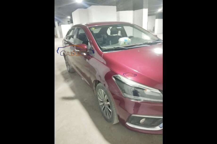 Ciaz Suzuki 2022 Nasr city Dark red 6993779 - Car for sale : Hatla2ee