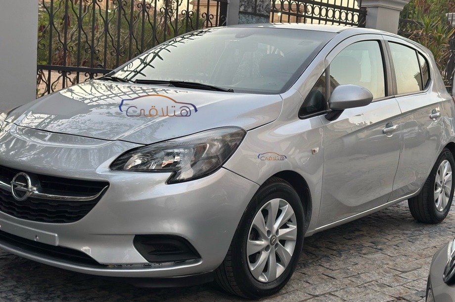 Corsa Opel 2016 Sheikh Zayed City Silver 6993999 - Car for sale : Hatla2ee