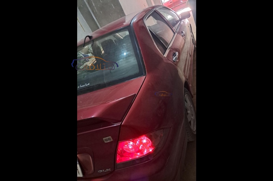 Lancer Puma Mitsubishi 2009 El Marg Dark red 6997928 - Car for sale ...