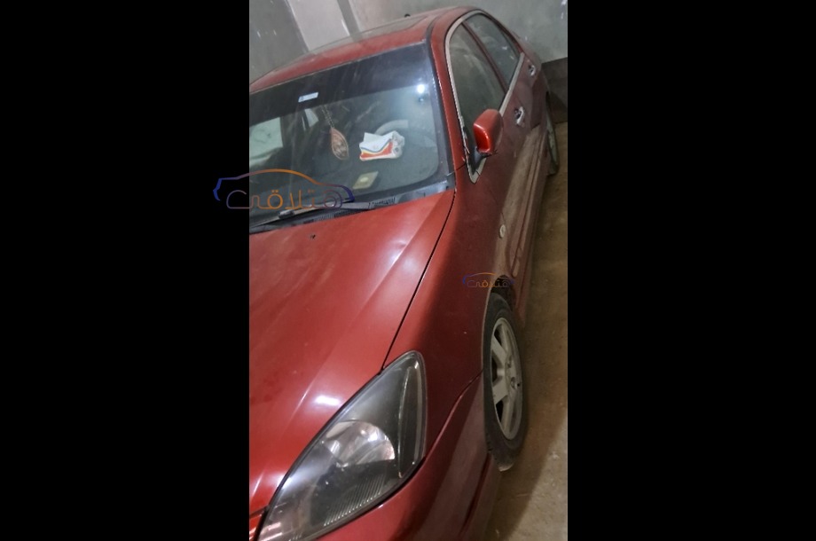 Lancer Puma Mitsubishi 2009 El Marg Dark red 6997928 - Car for sale ...