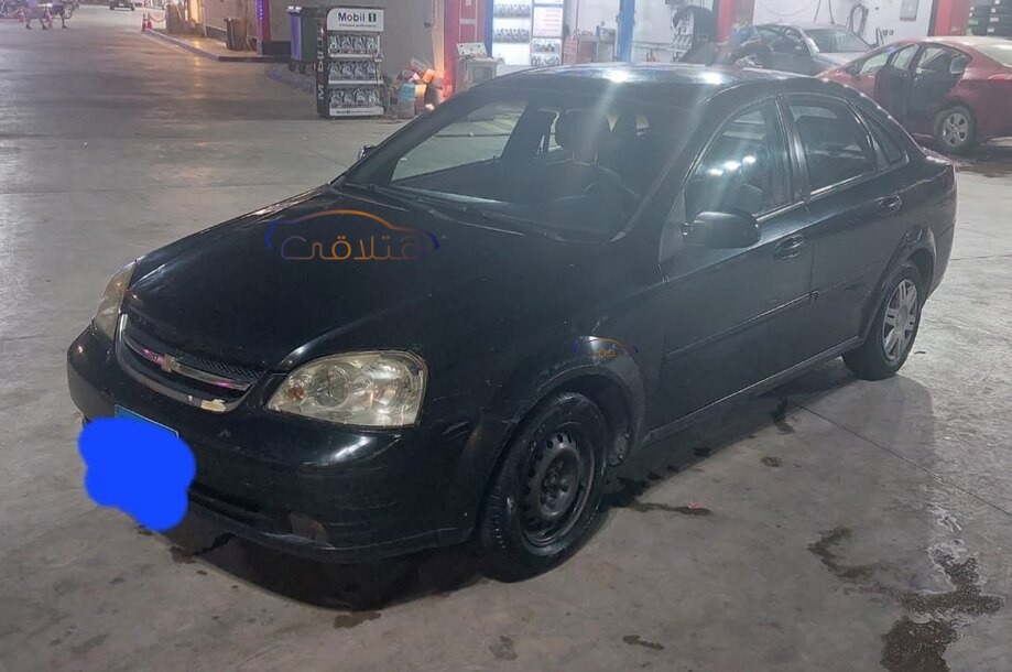 Optra Chevrolet 2010 Nasr city Black 6997947 - Car for sale : Hatla2ee