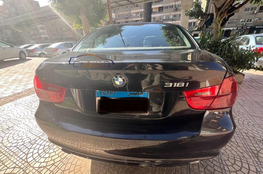 318 BMW 2010 Cairo Black 6999006 - Car for sale : Hatla2ee